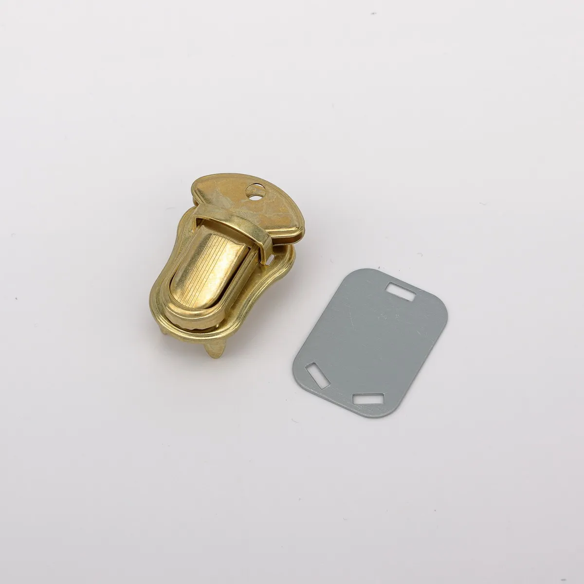 Secure Your Bag with Made in Japan Brass Thumb Tuck Lock