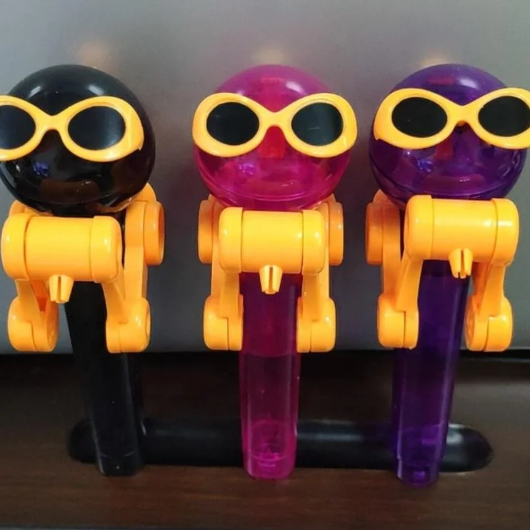 Newest Creative Plastic Lollipop Holder Robot Candy Toys For Promotion ...