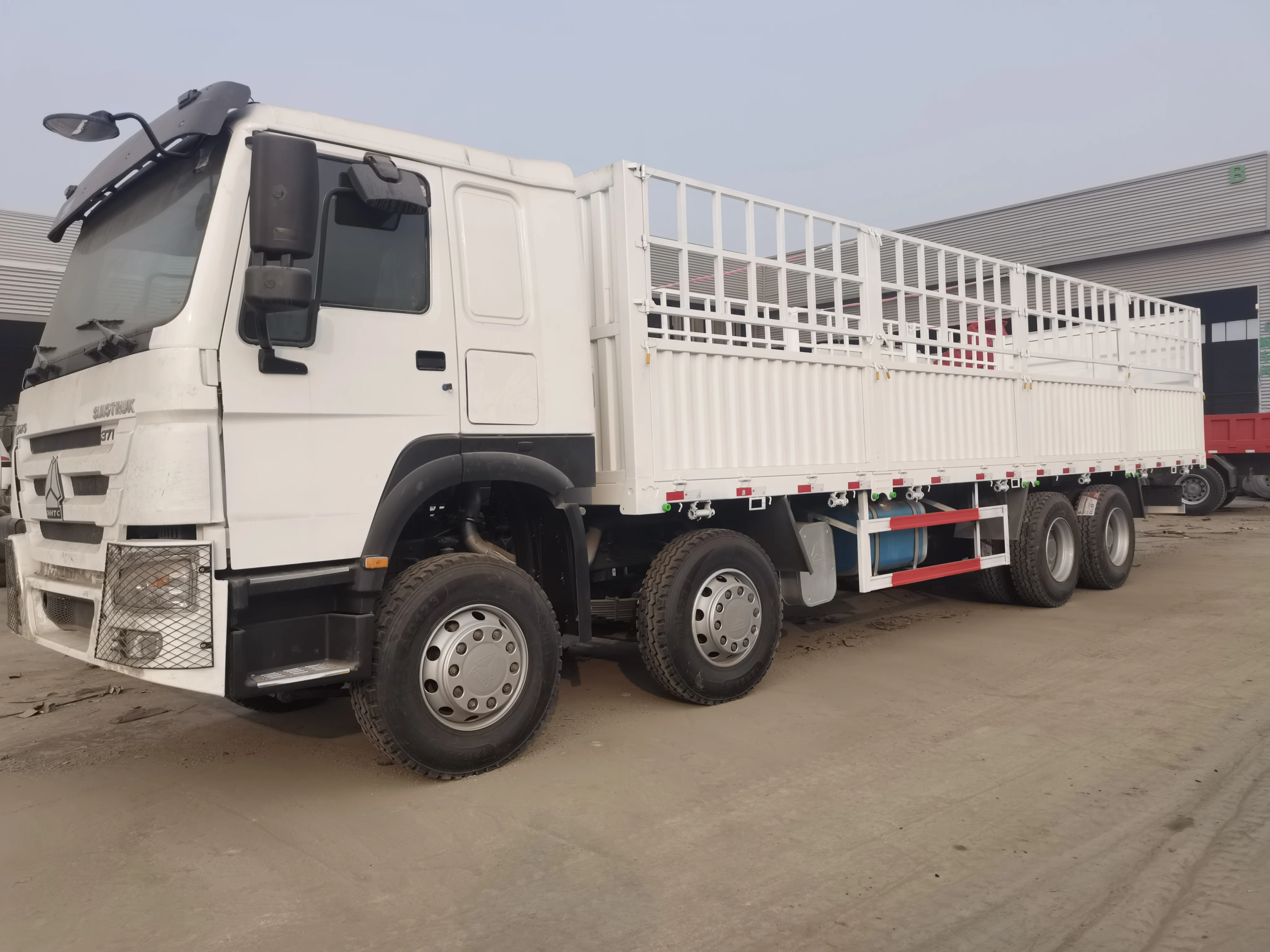 Used Sinotruck 8x4 371hp Fence Cargo Truck For Sale With Good Price ...