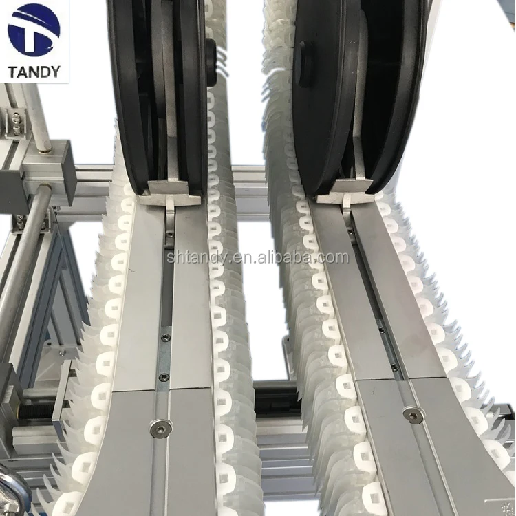 China Manufacturer Vertical Lifting Clamp Conveyor For Plastic Bottles ...