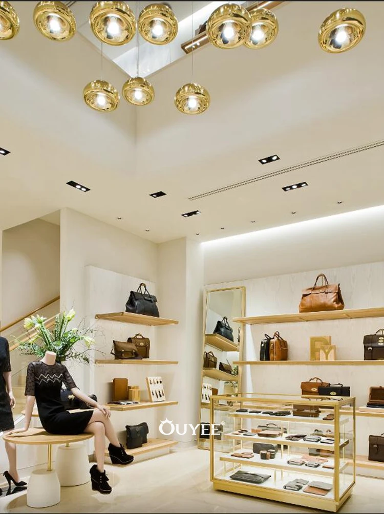 Luxury Handbag Store Interior Design - Gold Stainless Steel