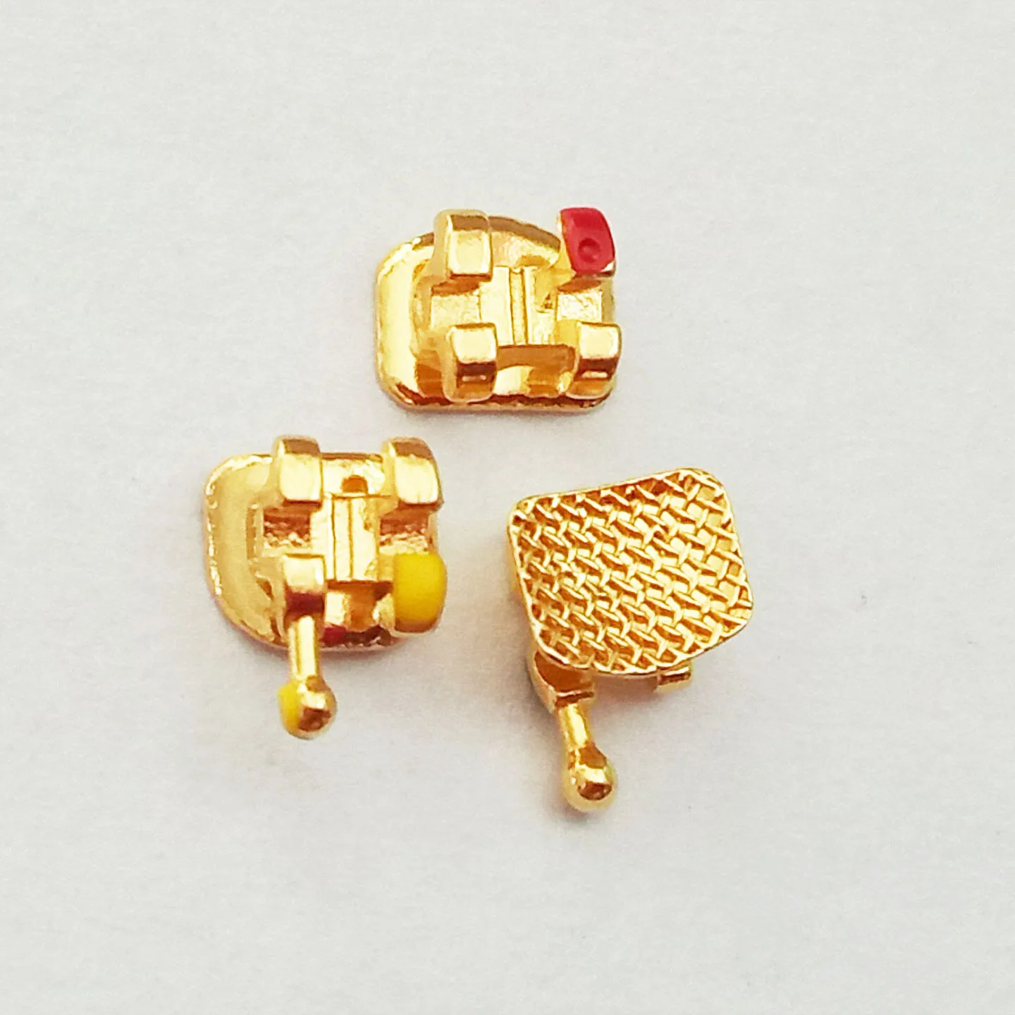 Dental Stainless Steel Orthodontic Golden Color Mesh Bracket - Buy ...