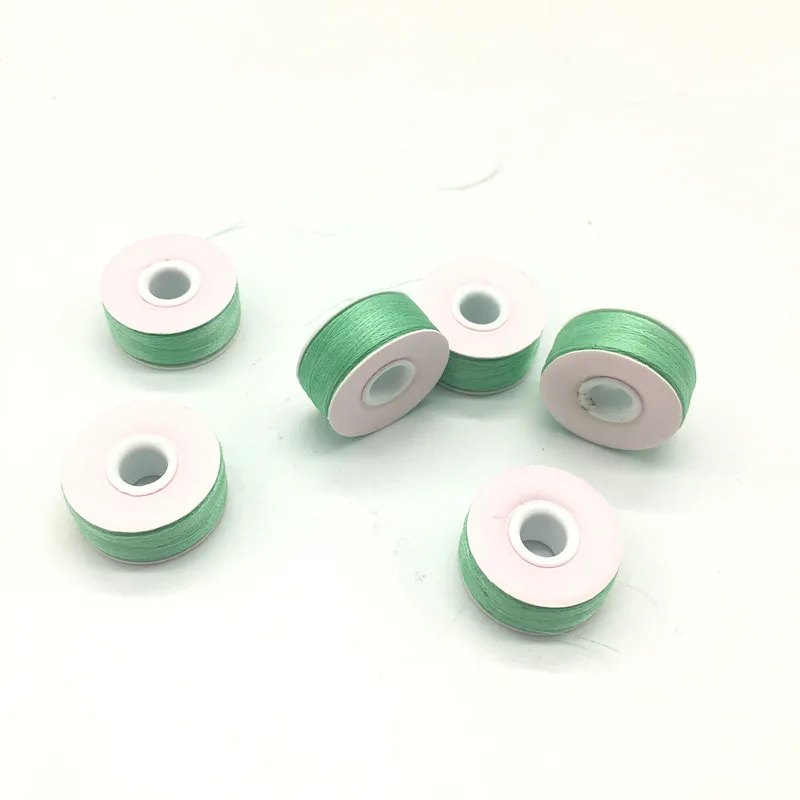 绿色 100% Polyester Bobbin In 螺纹尺寸 L 75d/2 预绕线 - Buy 刺绣机预绕线筒，100% 聚酯线筒，线筒预绕线 Product on Alibaba.com