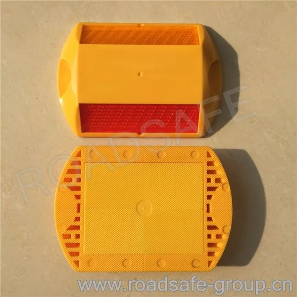 Enhance Pedestrian Safety with Red Reflectors on Road