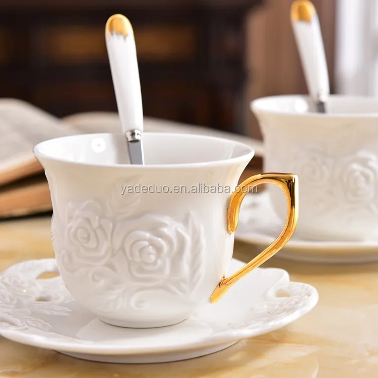 Elegant White Embossed Floral Ceramic Tea Cup with Gold Handle