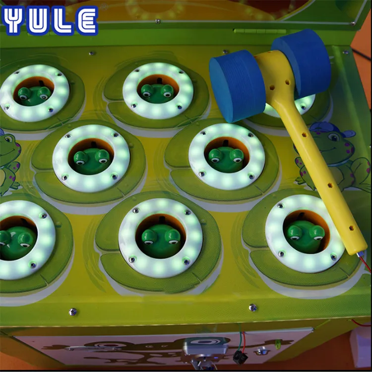 Kids Hitting Hammer Whack a Mole Game Machine - Coin-Operated Arcade Fun