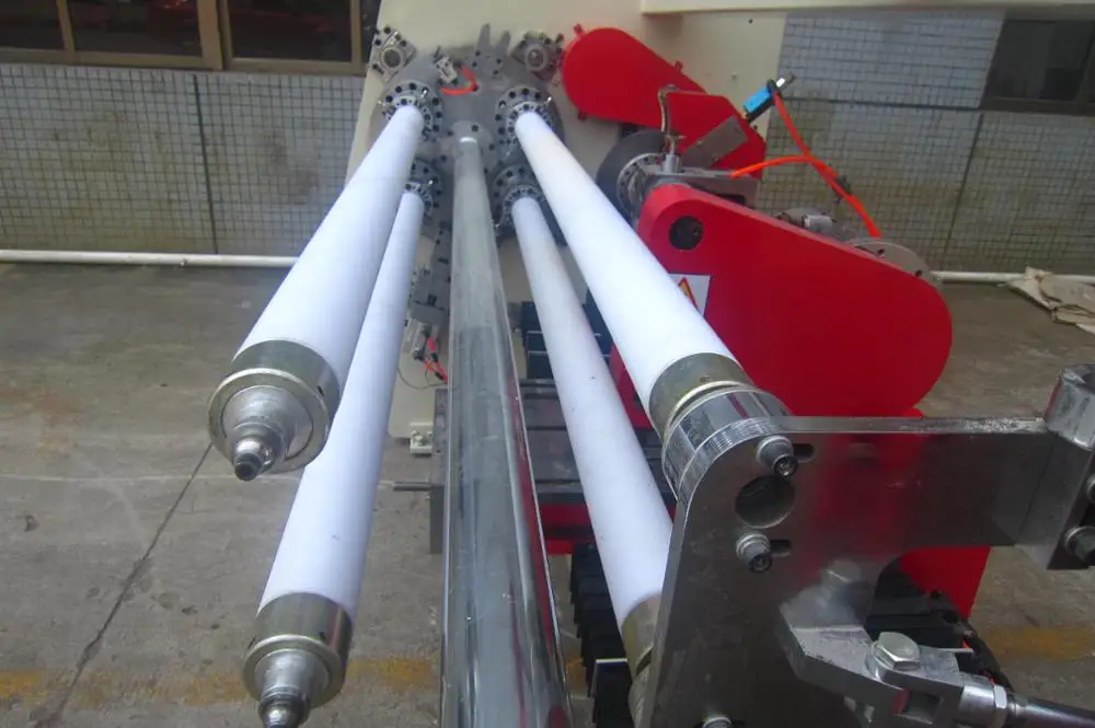 Full Automatic and Multifunction Roll Cutting Machine with Four Shafts ...