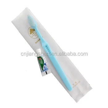 Hotel Disposable Toothbrush And Toothpaste Packed In Paper Package ...