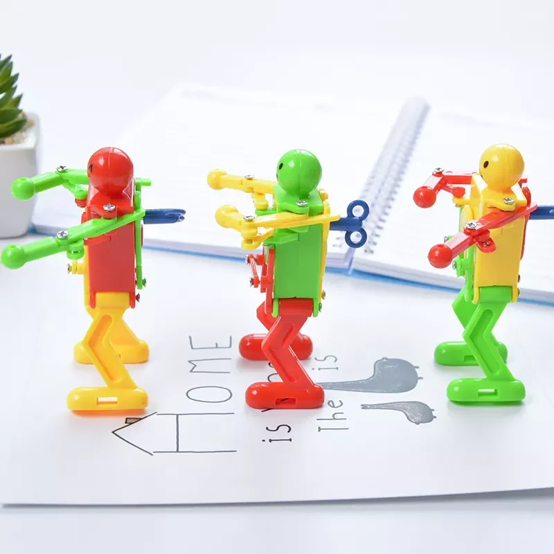 Wholesale Colorful Fidget Wind Up Dance Robot Toy Plastic Dancing Robot ...