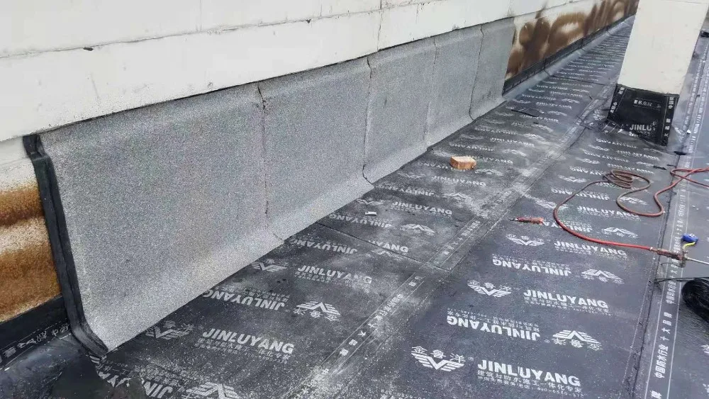 Elastomeric Bitumen Waterproofing Membrane With Grey Slates On Top ...