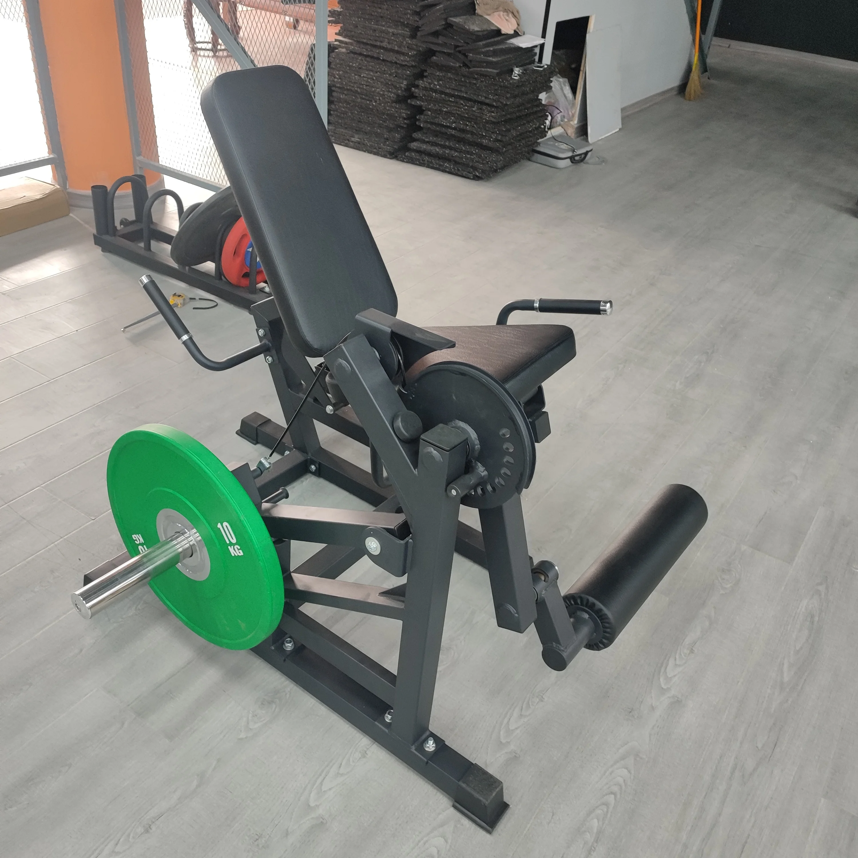 Plate Loaded Seated Leg Extension Trainer And Prone Leg Curl Workout ...