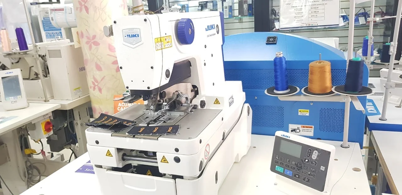 Used Computer-controlled Eyelet Buttonholing Sewing System Jukis Made ...