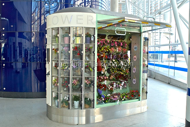 Indoor Flower Kiosk Display - Glass Design & Flower Shop Layout