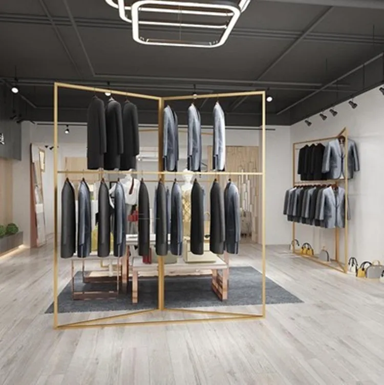 Diseño de mostrador dorado, rack personalizado para tienda de ropa