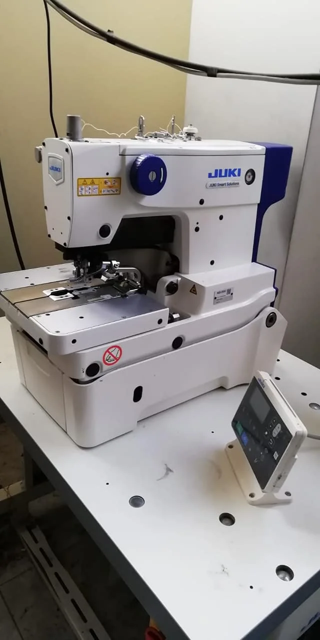Used Computer-controlled Eyelet Buttonholing Sewing System Jukis Made ...